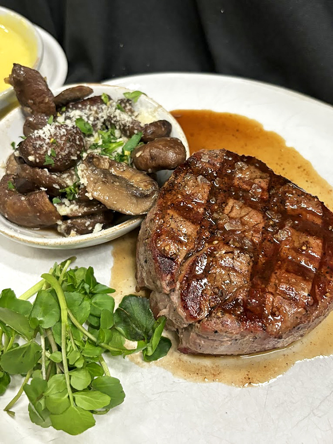 Behold the star of the show&mdash;a perfectly seared filet mignon resting in its own juices, accompanied by mushrooms that clearly got the VIP treatment.