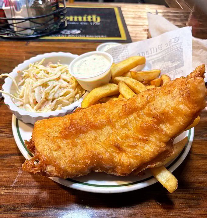 Golden, flaky, and larger than the plate it sits on&mdash;this fish practically begs you to break through its crispy armor to the tender cod within.