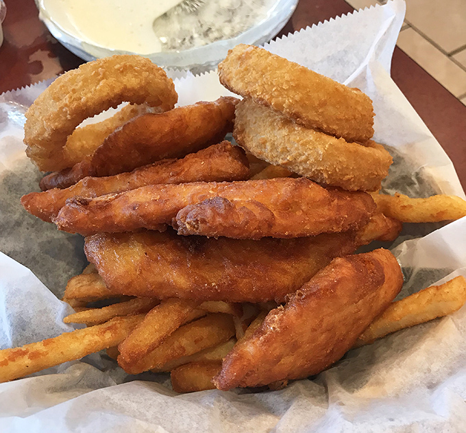 Golden-battered fish and crispy fries nestled in a paper-lined basket &ndash; the kind of simple perfection that makes you wonder why you'd ever eat anything else.