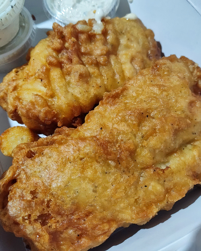 Golden-battered fish that would make Lake Michigan proud. This isn't just fried fish&mdash;it's edible sunshine with a crunch that echoes across the Northwoods.