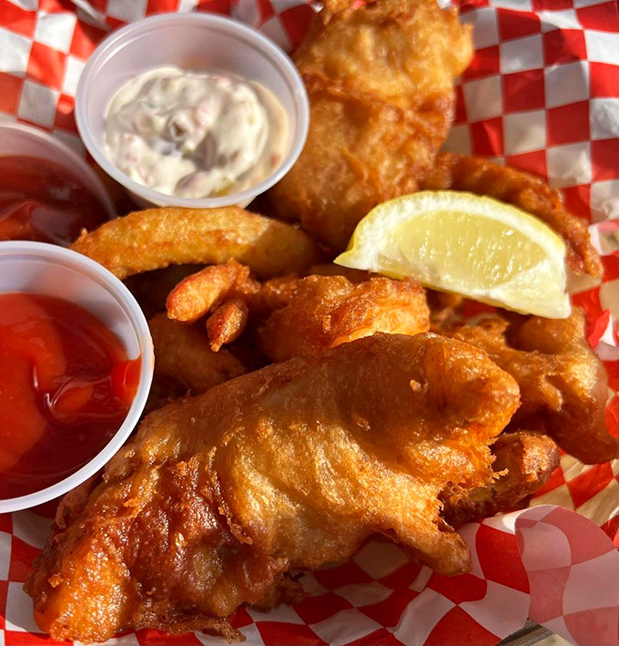 Golden-battered fish that shatters with each bite, paired with crispy fries and house-made sauces&mdash;proof that perfection needs no garnish.