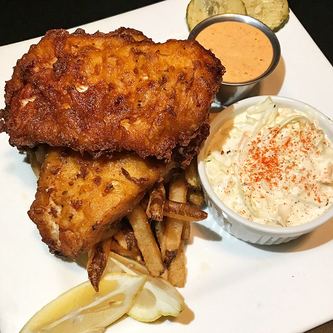 Golden-battered haddock that shatters at first bite, served with hand-cut fries and house-made coleslaw &ndash; this is what food dreams are made of.