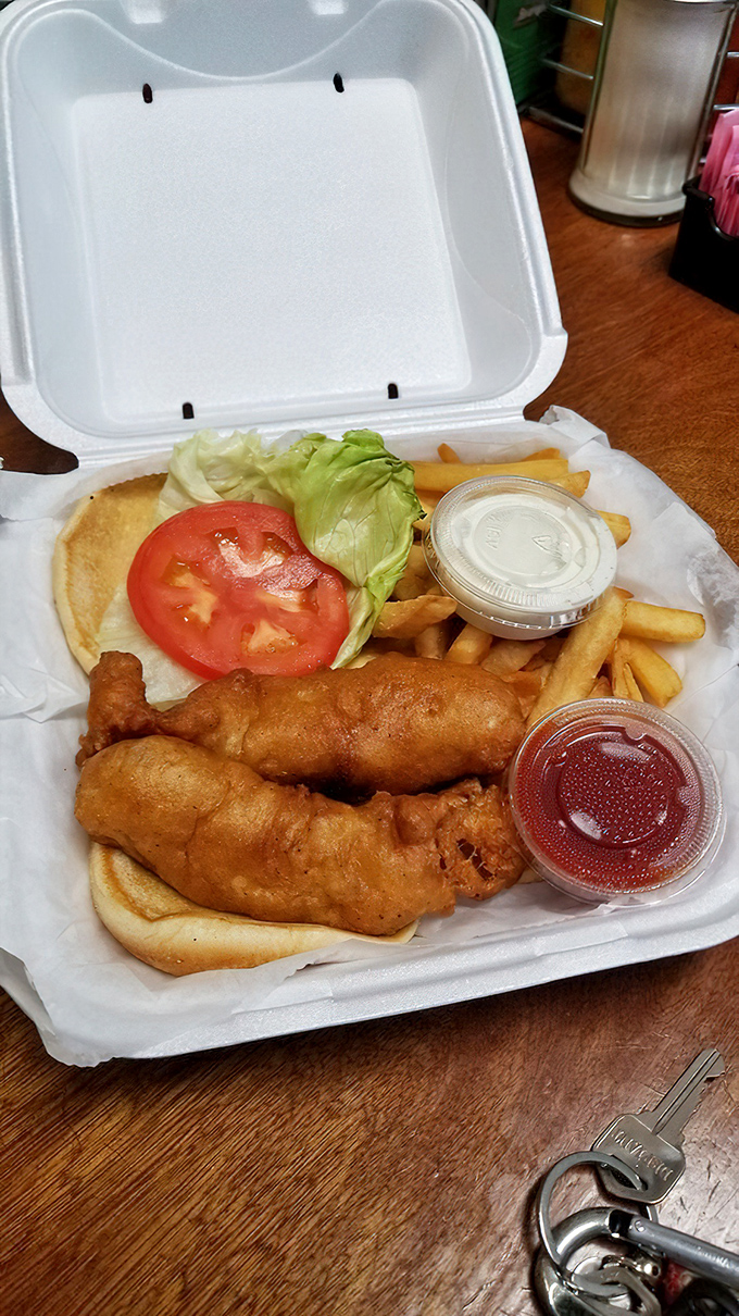 The star of the show: a fish sandwich so perfectly golden and flaky, it makes you wonder if they have a direct hotline to Poseidon himself.