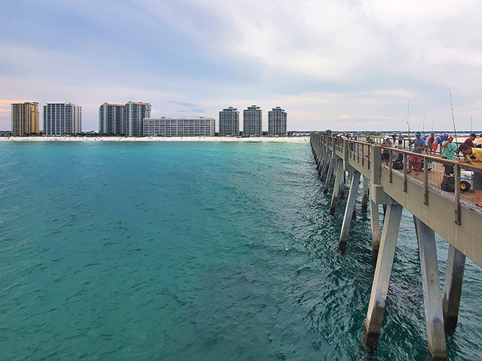 Fishing tales begin here: From Navarre Pier, anglers cast their hopes into emerald waters while tourists snap photos that friends back home won't believe aren't filtered.