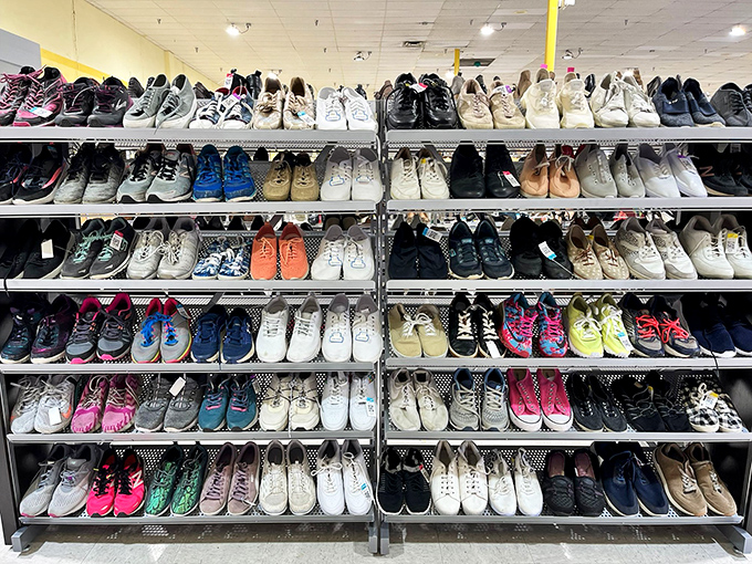 Sneaker heaven! Row after meticulous row of footwear awaits new adventures. Someone's barely-worn Nikes could be your next lucky find.