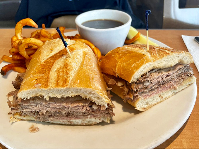 This French dip sandwich isn't just lunch&mdash;it's an architectural marvel of tender meat and crusty bread that demands to be dunked with reckless abandon.