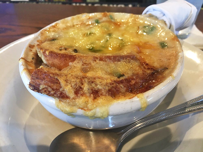 Behold the French onion soup that launched a thousand food pilgrimages. That cheese pull deserves its own Instagram account.
