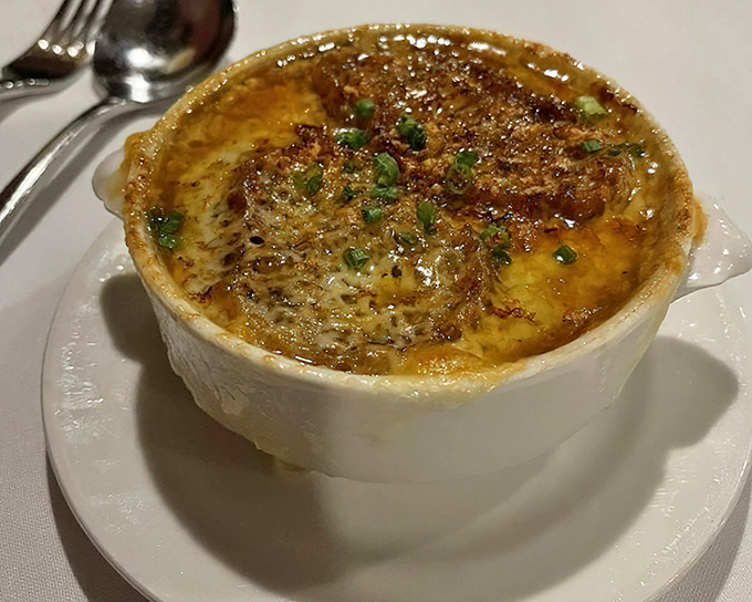 This isn't your college apartment's French onion soup. Bubbling cheese creates that perfect Instagram-worthy cheese pull that would make Julia Child weep with joy.
