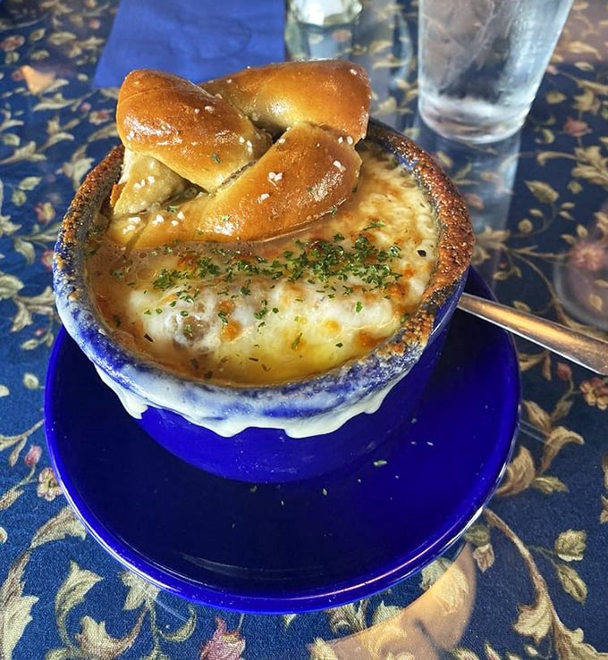 Behold the French onion soup in all its glory&mdash;a bubbling cauldron of caramelized heaven topped with a bronzed cheese cap that stretches for days.
