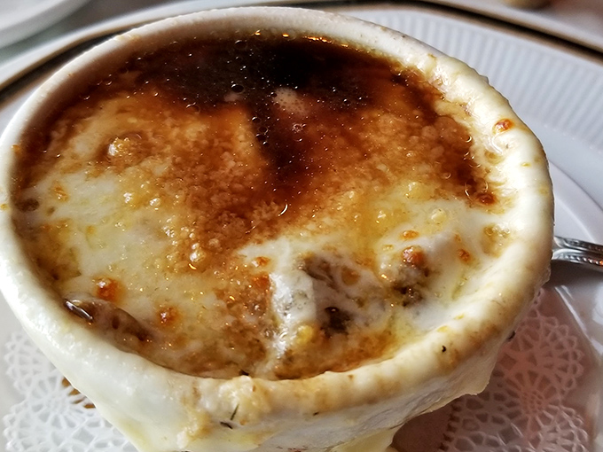 The legendary French onion soup arrives like a bubbling cauldron of comfort &ndash; that cheese pull should have its own Instagram account.