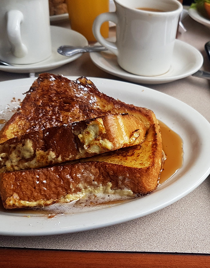 French toast that doesn't just break the fast but makes the morning. Golden, crispy edges giving way to a custardy center&mdash;proof that simplicity, when done right, is culinary poetry.