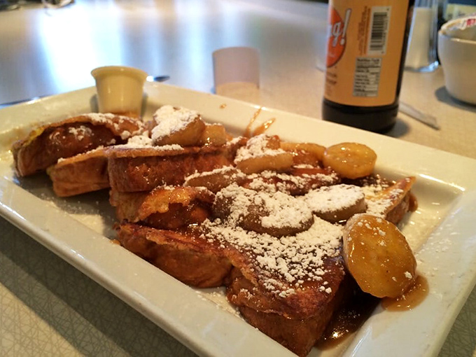 Behold the French toast that launched a thousand return visits. That dusting of powdered sugar isn't decoration—it's a snow-capped mountain of flavor.