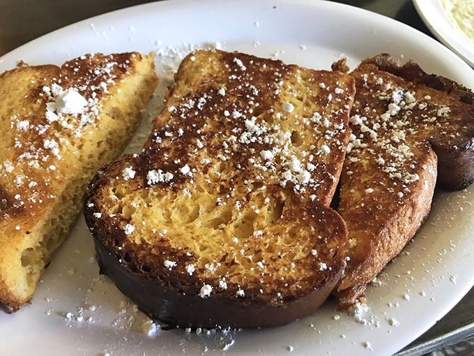 Golden-brown French toast dusted with powdered sugar&mdash;proof that simplicity, when executed perfectly, can outshine the fanciest culinary creations on earth.