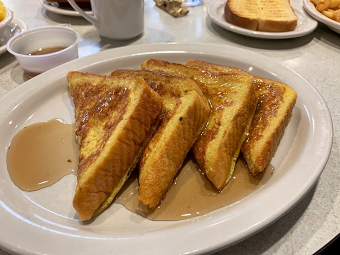 Golden triangles of French toast glistening with syrup &ndash; this isn't just breakfast, it's the reason alarm clocks were invented.