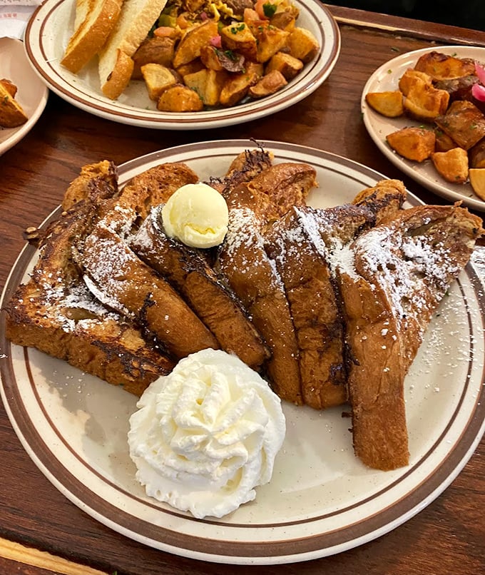 French toast that doesn't just flirt with decadence&mdash;it's in a full-blown relationship. That dollop of butter slowly melting is practically food poetry.
