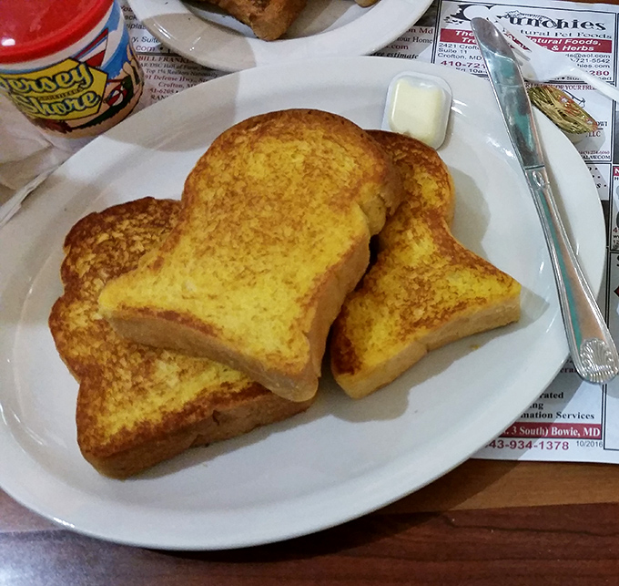 Golden-hued French toast that's achieved that mythical balance &ndash; crispy edges giving way to a custardy center that makes time stand still.