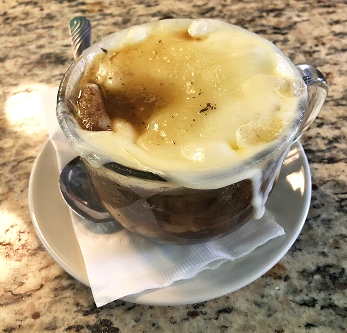 Behold the French onion soup that started it all &ndash; cheese cascading like a delicious avalanche.