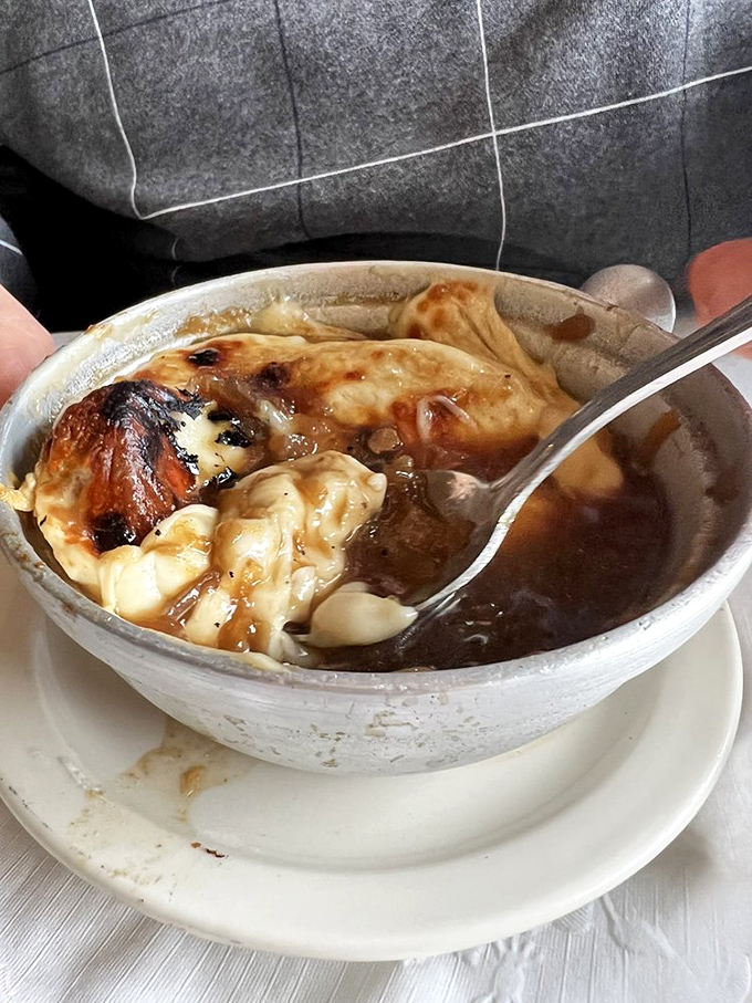 French onion soup that doesn't mess around&mdash;the cheese pull alone deserves its own Instagram account.