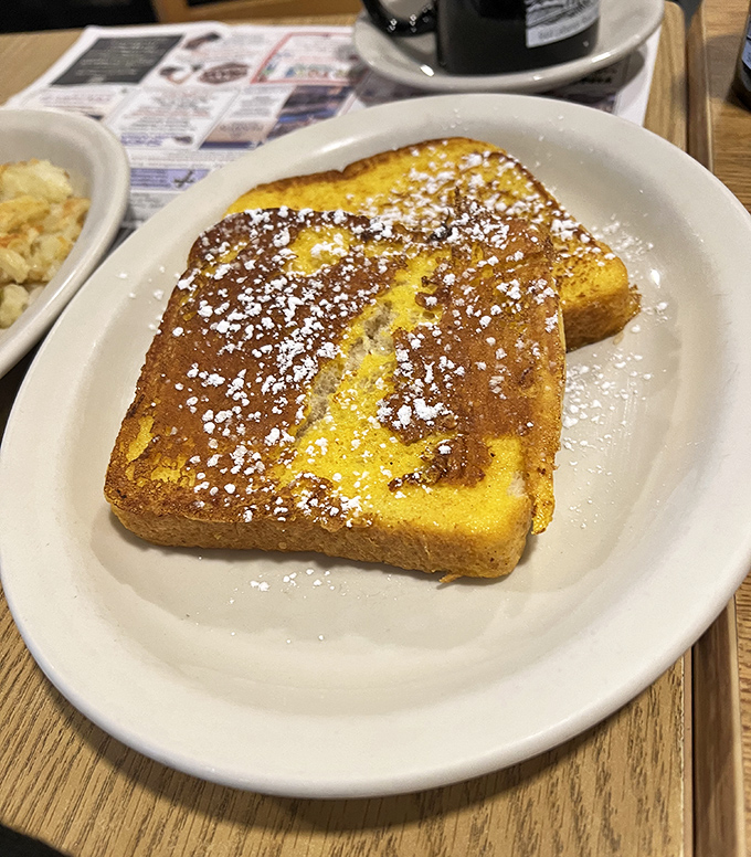 Golden perfection on a plate&mdash;their French toast dusted with powdered sugar is simple, unpretentious, and absolutely magnificent.