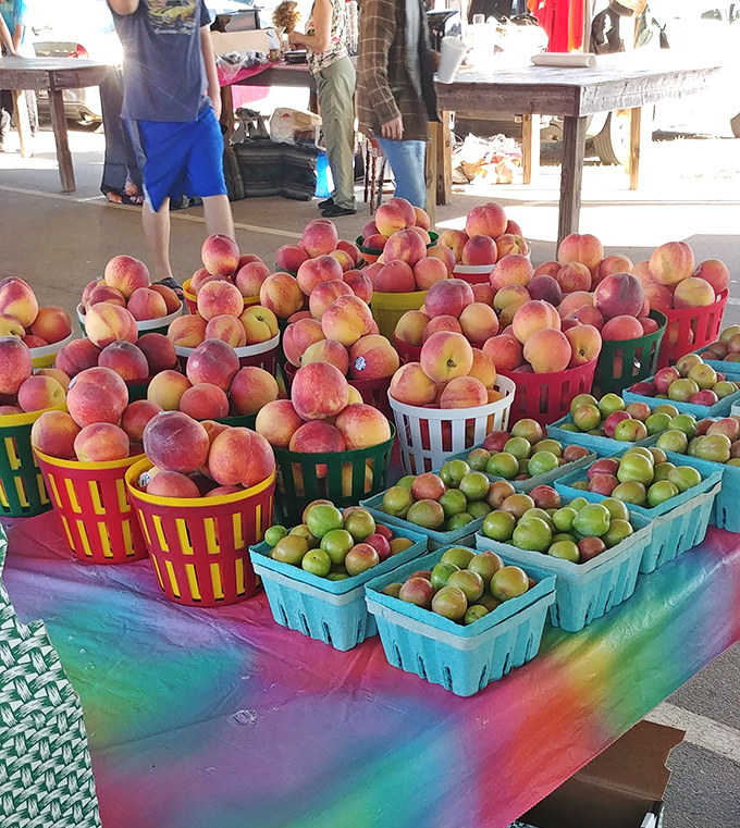 Summer's bounty displayed in technicolor glory. These South Carolina peaches and apples aren't just fruit&mdash;they're edible sunshine waiting to be taken home.