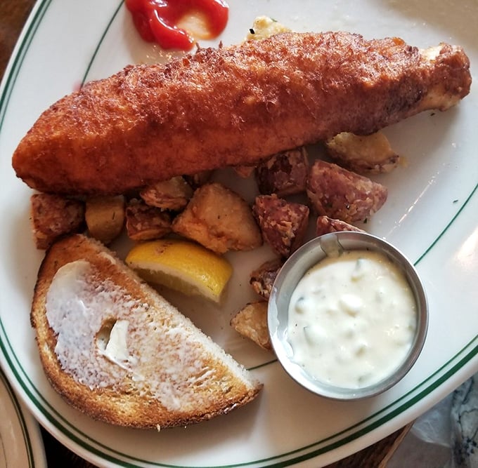 Golden-crusted fish that makes Friday feel like a holiday. That tartar sauce cup isn't nearly big enough for the dipping marathon ahead.