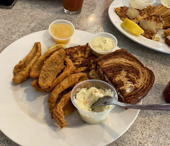 Friday's religion in Wisconsin: golden-battered fish, marble rye, creamy coleslaw, and tartar sauce that could make a vegetarian reconsider their life choices.