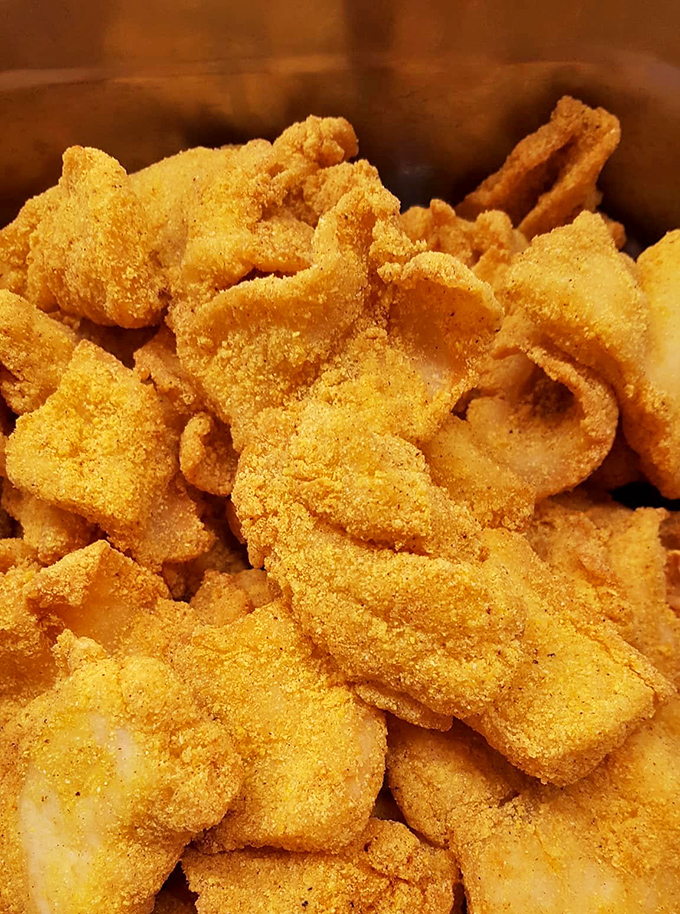 Golden treasures from the fryer – these catfish fillets aren't just cooked, they're transformed into crunchy, cornmeal-kissed morsels of Missouri magic.