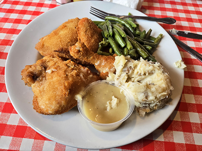 Golden-brown perfection that makes you question every other fried chicken you've ever eaten. The sides aren't afterthoughts &ndash; they're worthy companions.