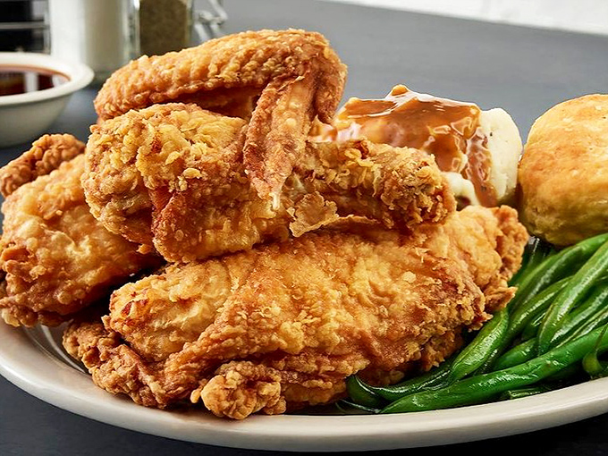 Golden-brown perfection that makes Colonel Sanders look like an amateur. This fried chicken doesn't just speak&mdash;it sings a Southern symphony.