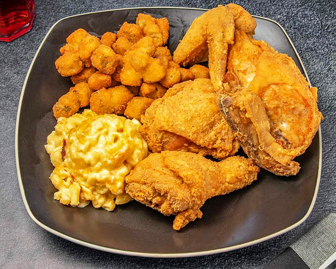 Golden-brown perfection that makes you want to write poetry. This fried chicken with mac and cheese might just be worth crossing state lines for.