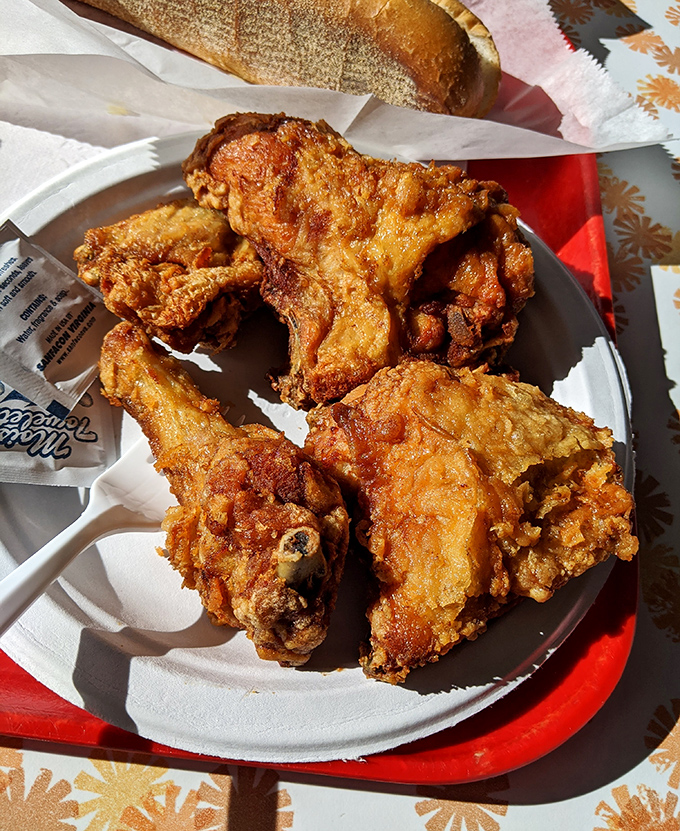 Golden-brown perfection that makes you question every other fried chicken you've ever eaten. The kind of crispy exterior that announces itself with each heavenly crunch.