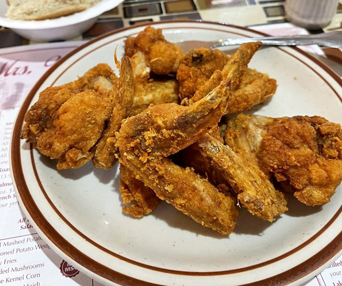 Golden-brown perfection that makes Colonel Sanders look like an amateur. This fried chicken doesn't just talk the talk&mdash;it clucks the cluck.