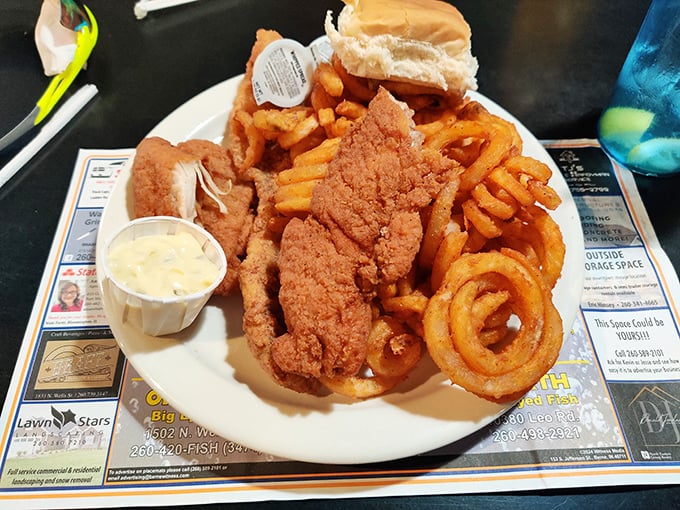 Golden perfection on a plate &ndash; this fried fish arrives with onion rings that could make you forget your own name.