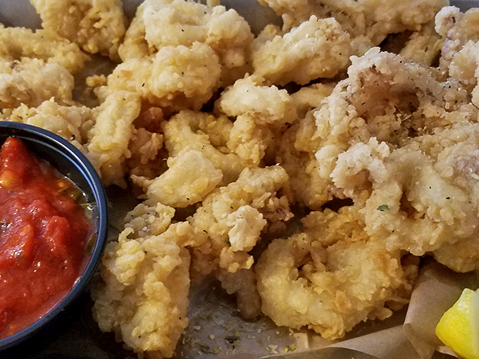 Golden-fried shrimp that crunch like autumn leaves, served with a sauce that makes you wonder why you'd eat seafood anywhere else.