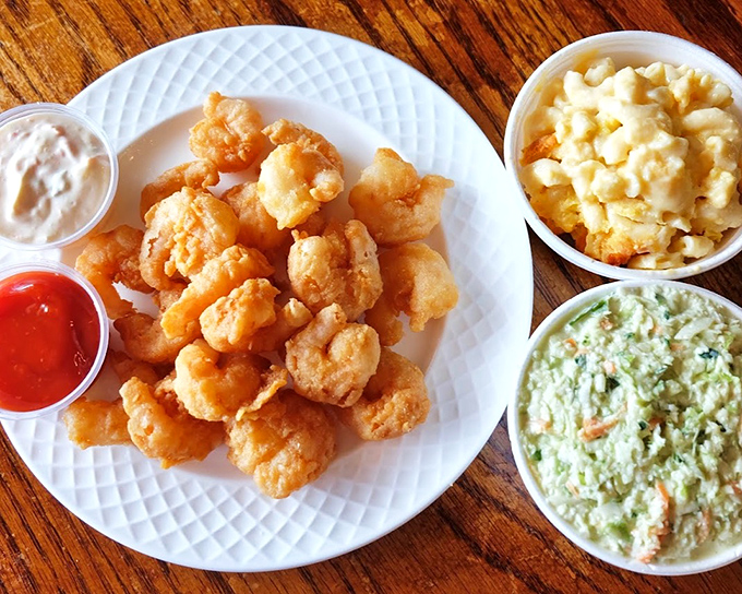 Golden-fried shrimp that crackle with each bite, flanked by creamy mac and cheese and coleslaw&mdash;a trio that could make a seafood lover weep with joy.