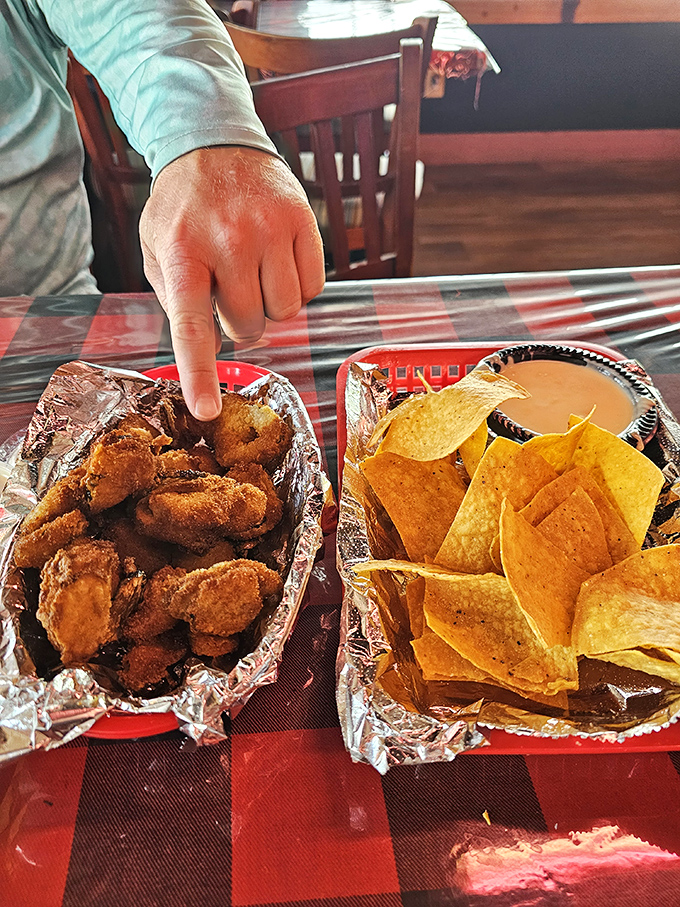 Golden-brown nuggets of catfish heaven, perfectly fried and waiting to be dunked in that house-made tartar sauce. Worth every mile driven.