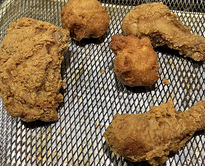 Golden-brown perfection resting on a cooling rack. Each piece is like a crunchy time machine to your grandmother's Sunday dinner.