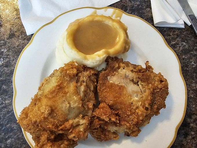 Golden-brown fried chicken with a crater of gravy-filled mashed potatoes &ndash; a plate that makes you wonder why you'd ever waste time eating anywhere else.