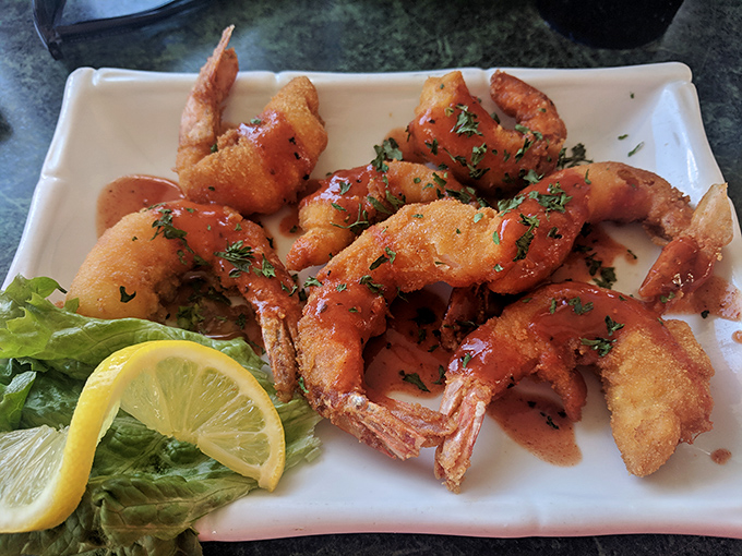 These golden-fried shrimp aren't just cooked&mdash;they're transformed into crispy treasures that would make Neptune himself swim ashore for a taste.