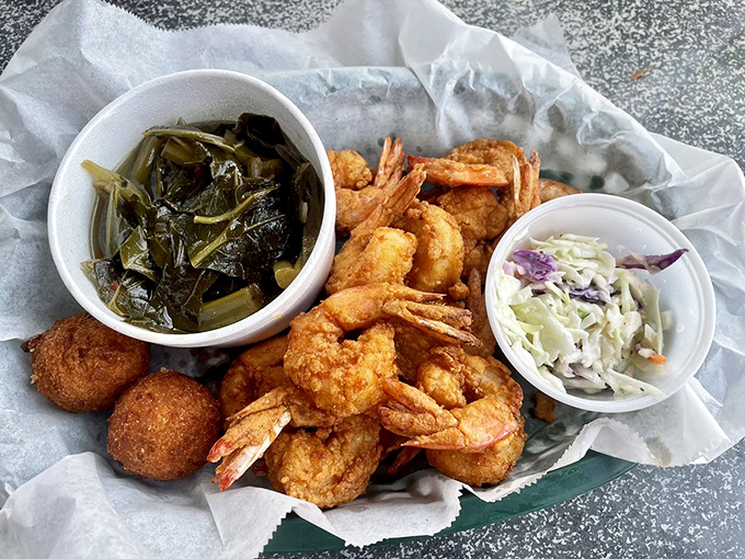 Golden-fried shrimp that snap between your teeth, collard greens swimming in pot liquor, and hush puppies that would make your Southern grandmother nod in approval.