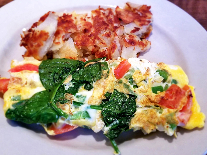 The star of the show &ndash; a frittata that's achieved that perfect balance between fluffy and substantial, with spinach and tomatoes playing supporting roles.