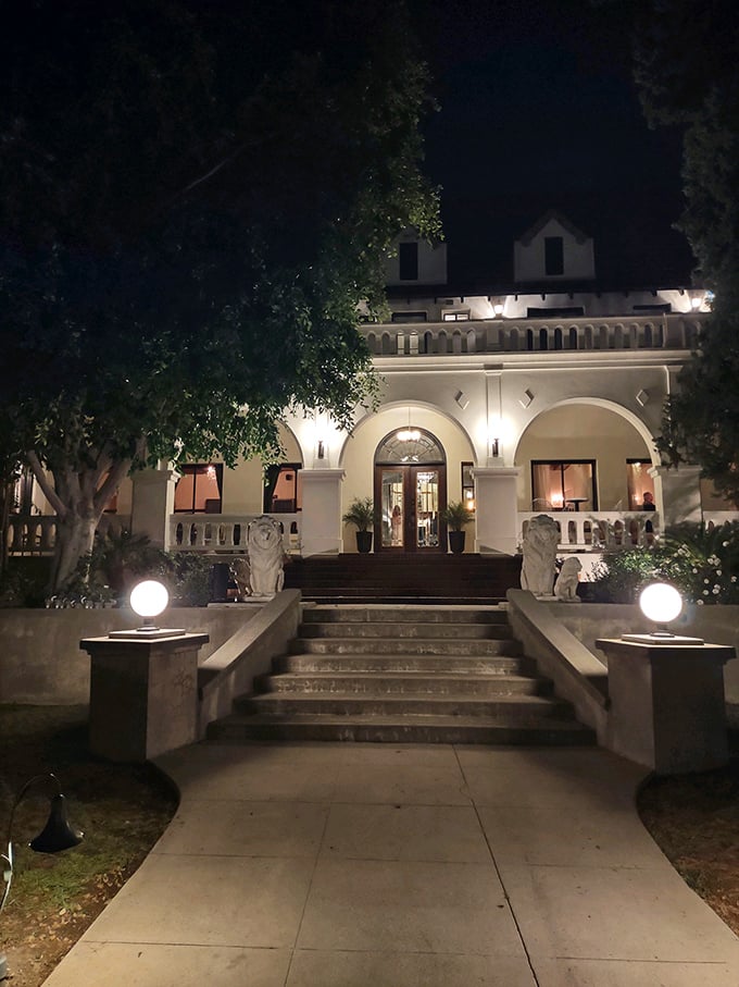 After dark, Wrensmoor transforms into a luminous beacon. Those grand entrance steps practically whisper, "Your carriage awaits, but an Uber works too."