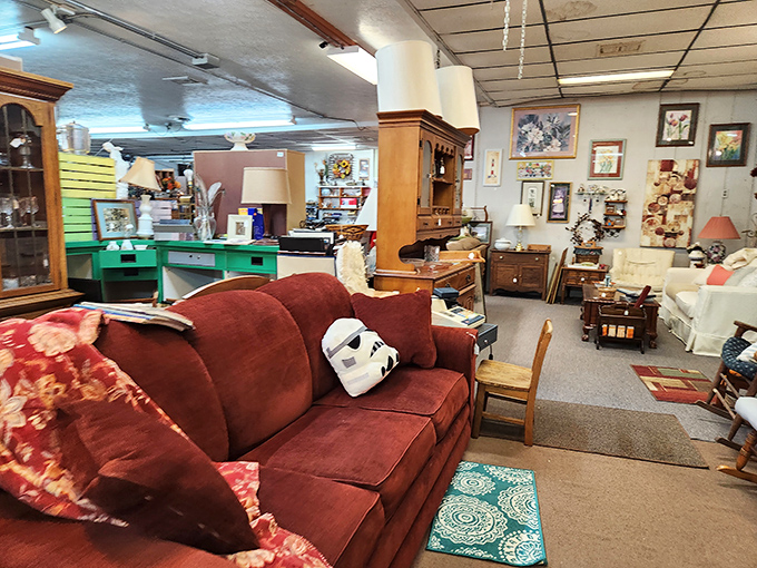 A Stormtrooper mask lounging on a burgundy couch? In the flea market universe, this unexpected pairing makes perfect, whimsical sense.