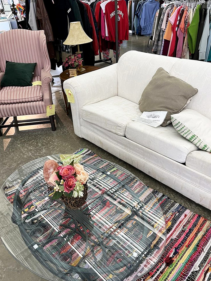 Living room goals on a ramen budget&mdash;this cozy furniture setup proves secondhand doesn't mean second-rate.