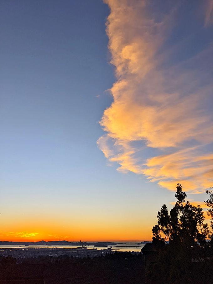A heavenly sunset paints the sky in hues that would make Monet jealous, turning an ordinary evening drive into a front-row seat at nature's art show.