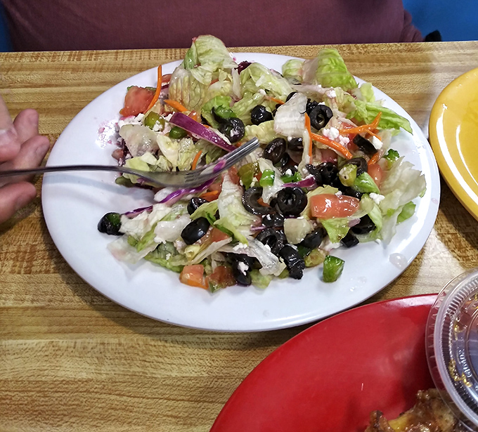 Behold the legendary Greek salad&mdash;a symphony of crisp lettuce, briny olives, and feta cheese that would make Zeus himself weep with joy.