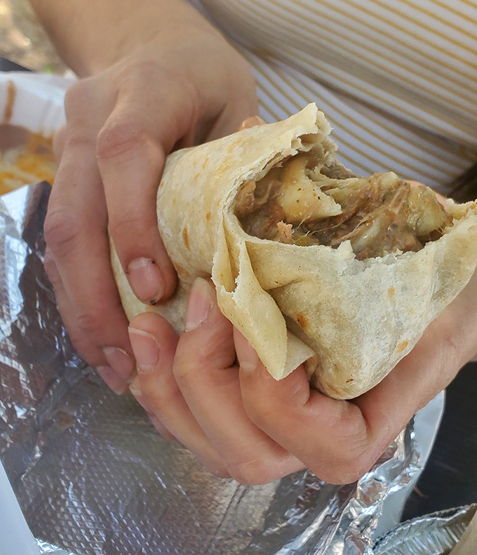 Behold the star of the show! This burrito isn't just wrapped, it's embraced by a perfect tortilla, with fillings that whisper sweet nothings to your taste buds.