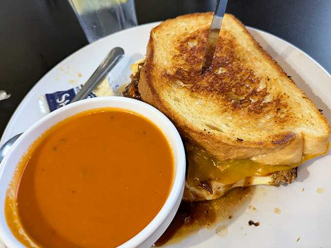 This golden-brown grilled cheese with tomato soup is the comfort food equivalent of a warm hug after a long day.