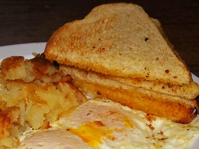 Behold the golden masterpiece that's converting skeptics into believers, one molten bite at a time.