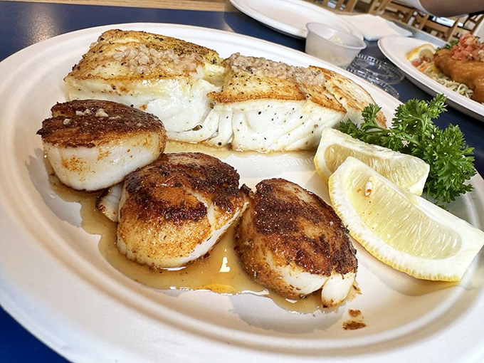 Perfectly seared scallops alongside buttery fish that flakes at the mere suggestion of a fork. This plate isn't trying to impress Instagram&mdash;it's trying to impress your taste buds. 